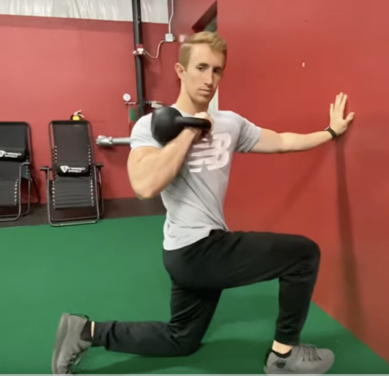 Exercise of the Week: Half-Kneeling Wall Press 1-arm Kettlebell ...